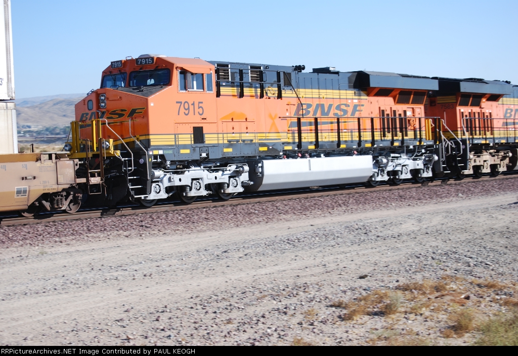 BNSF 7915 rolls past me as she heads east as a # 4 unit on a Z-Train.